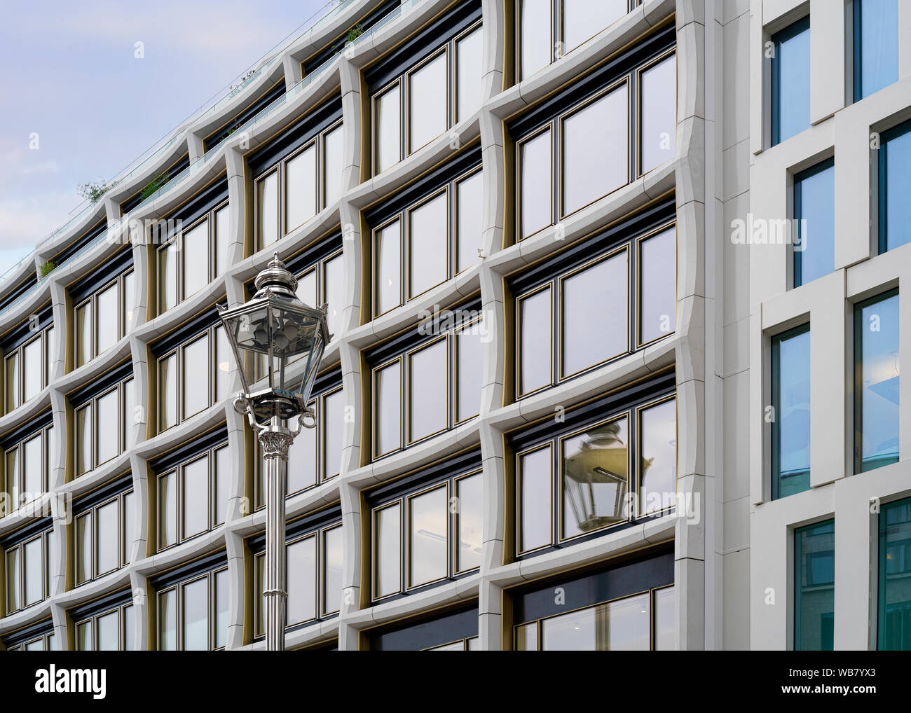 Modern glass skyscrapers as residential apartment house or office ...