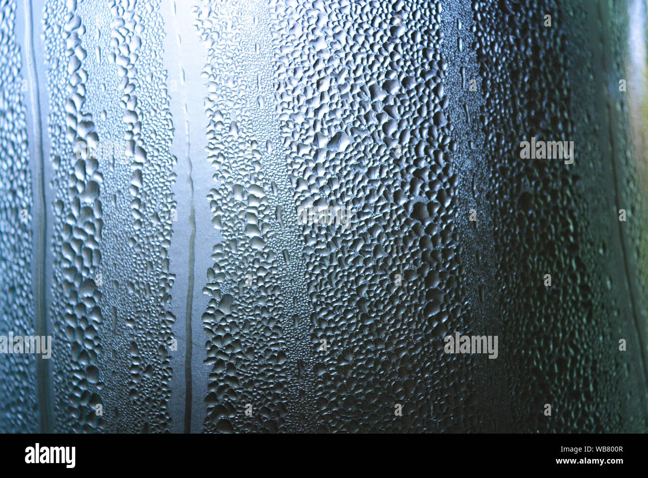 Transparent glass steamed with steam, condensation of water and small ...