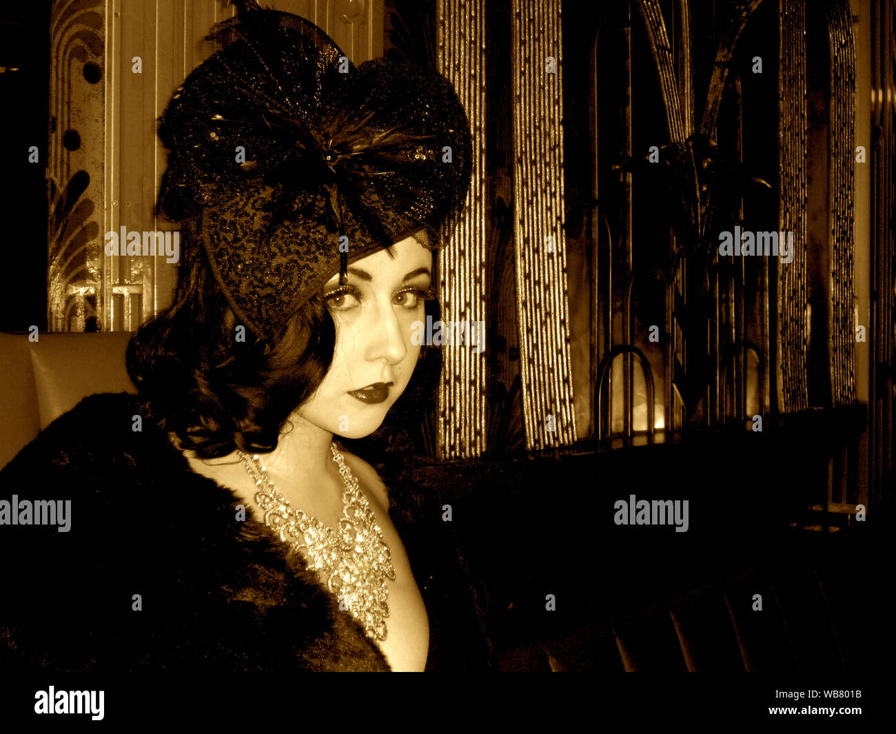 A burlesque performer relaxes in the Art Deco splender of Madam Jojo’s ...