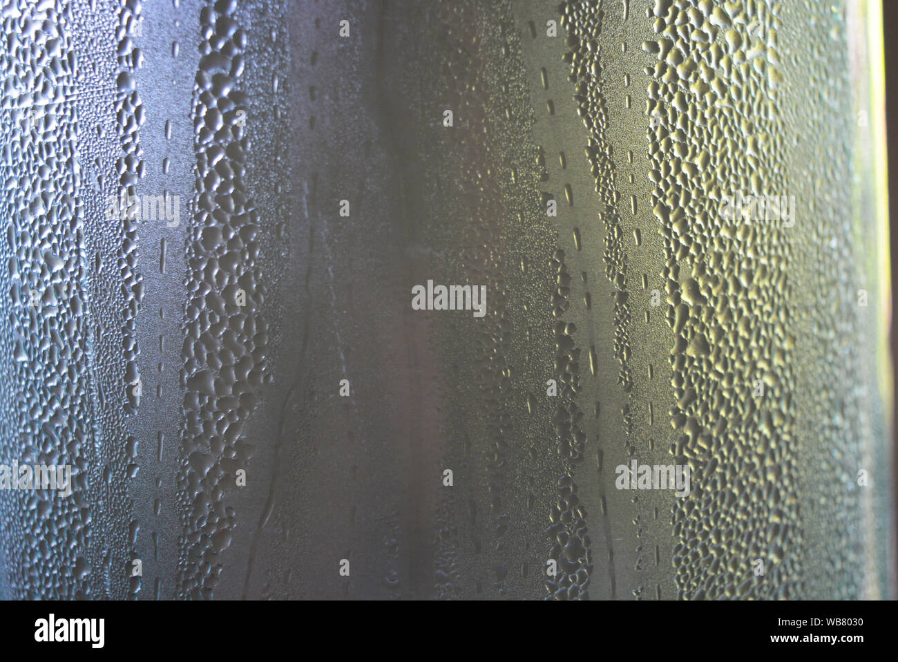 Transparent glass steamed with steam, condensation of water and small ...
