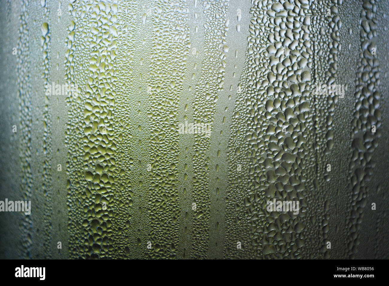 Transparent glass steamed with steam, condensation of water and small ...