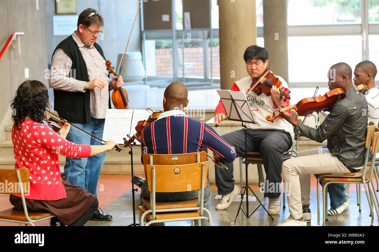 Johannesburg, South Africa - August 28 2010: Teacher at music school ...