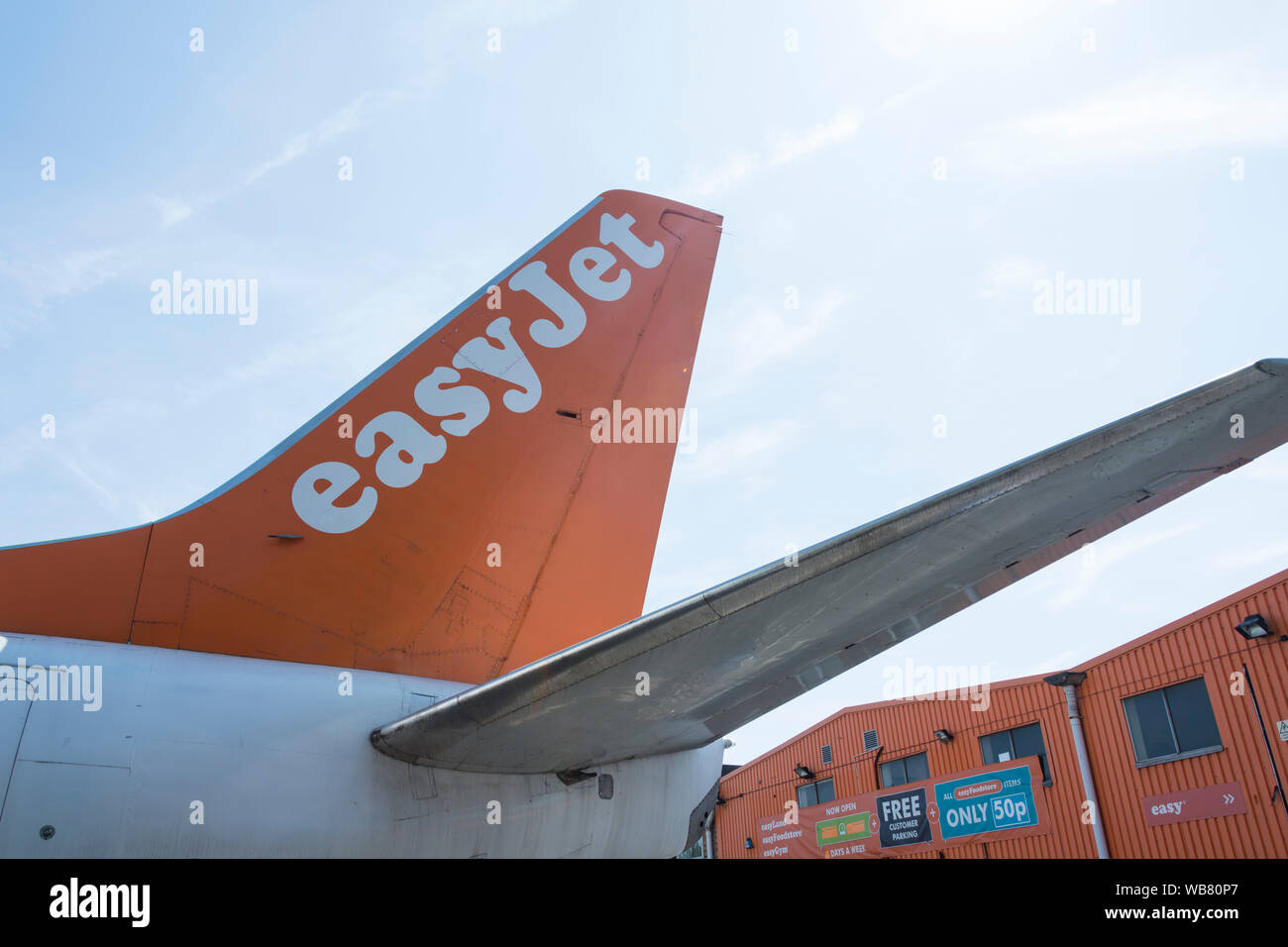 Orange plane with blue sky hi-res stock photography and images - Alamy