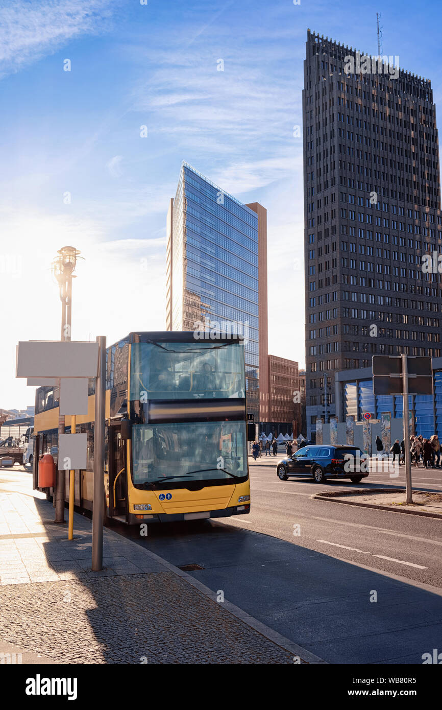 Street with Bus on the road and modern building architecture in ...