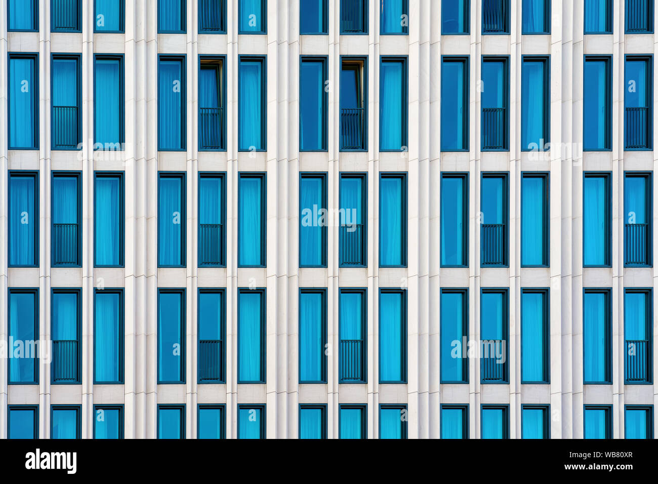 Modern Blue glass European apartment house and business building ...