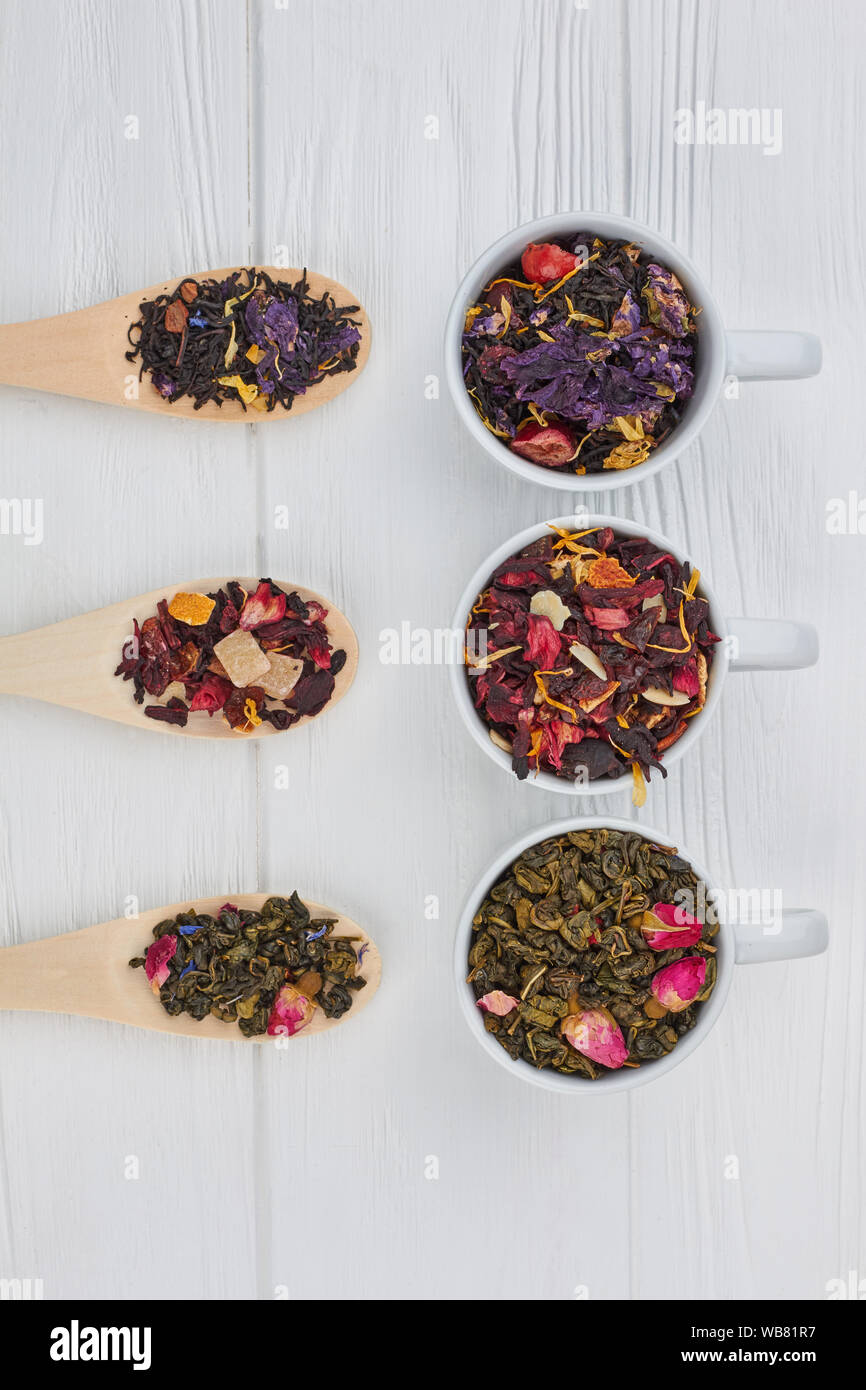 Different types of dry tea on white background Stock Photo - Alamy