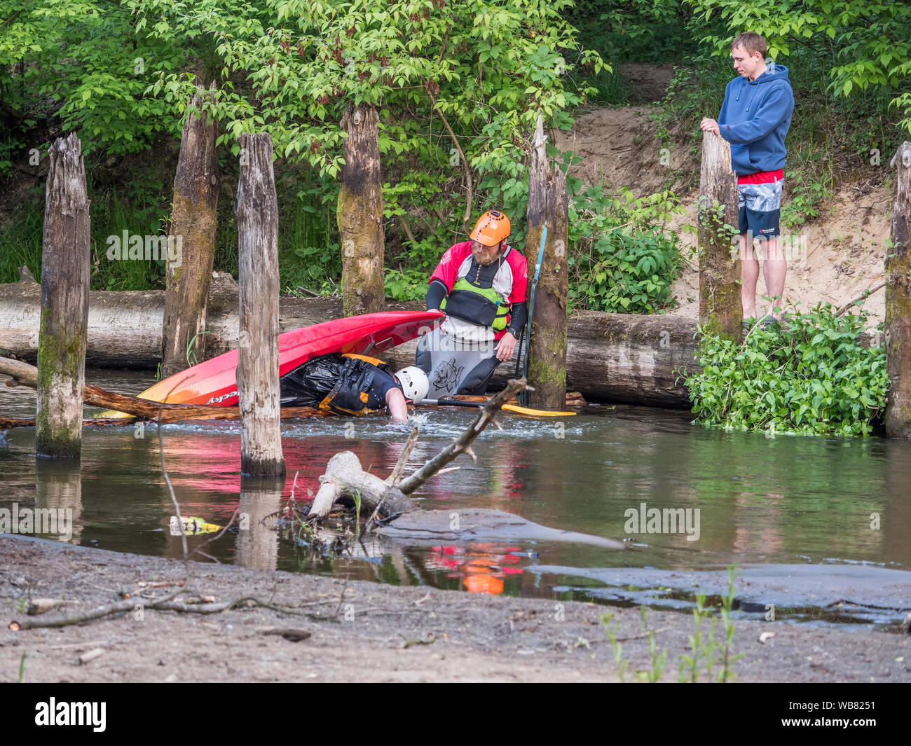 Józefów, Poland - May 12: canoeing, extreme kayaking. The guy in a ...