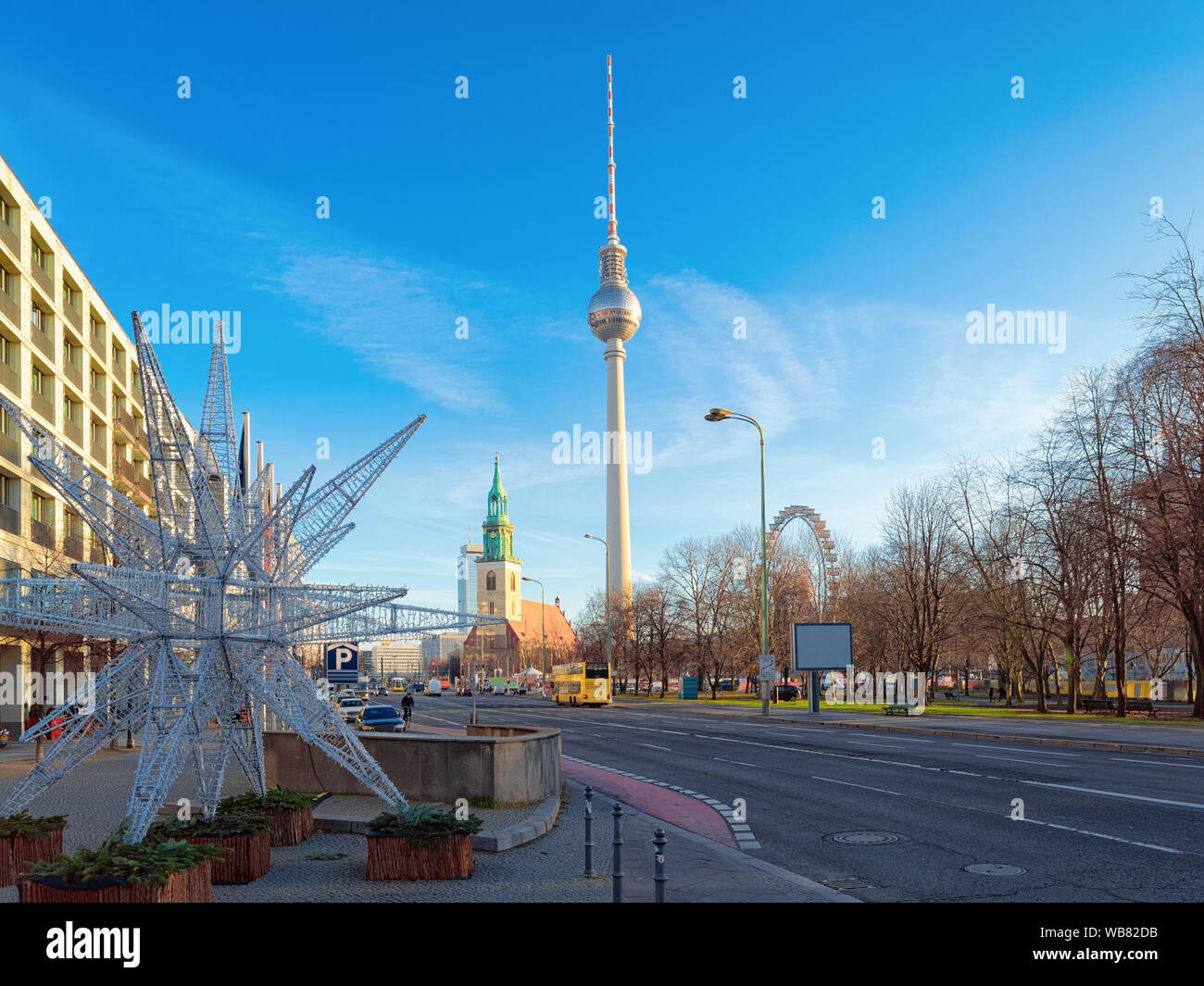 Cityscape with road in German City centre in Berlin with St Mary Church ...