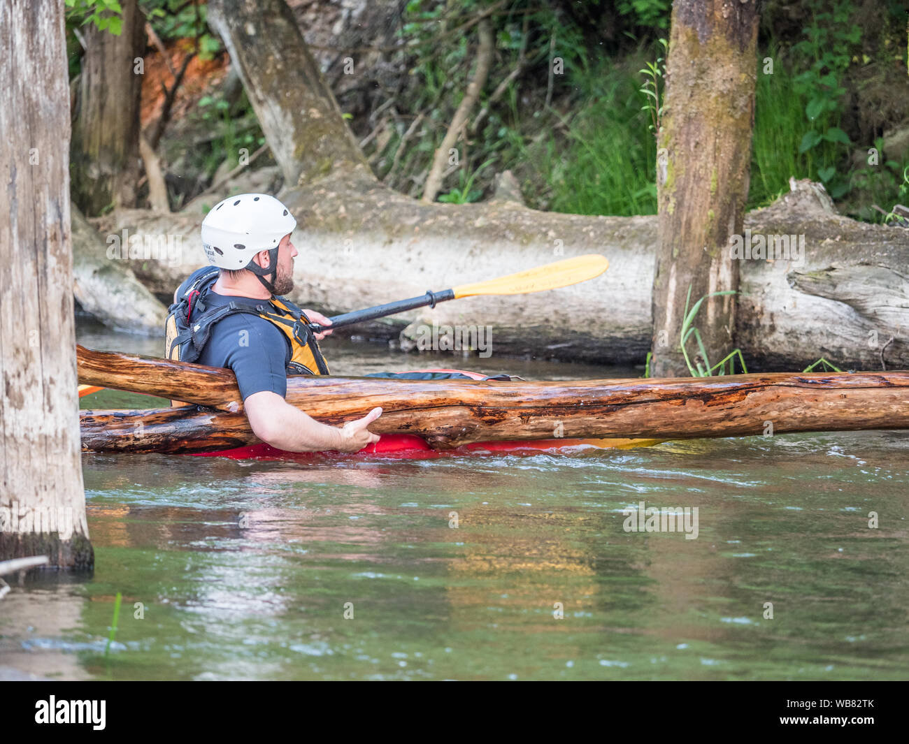 Józefów, Poland - May 12: canoeing, extreme kayaking. The guy in a ...