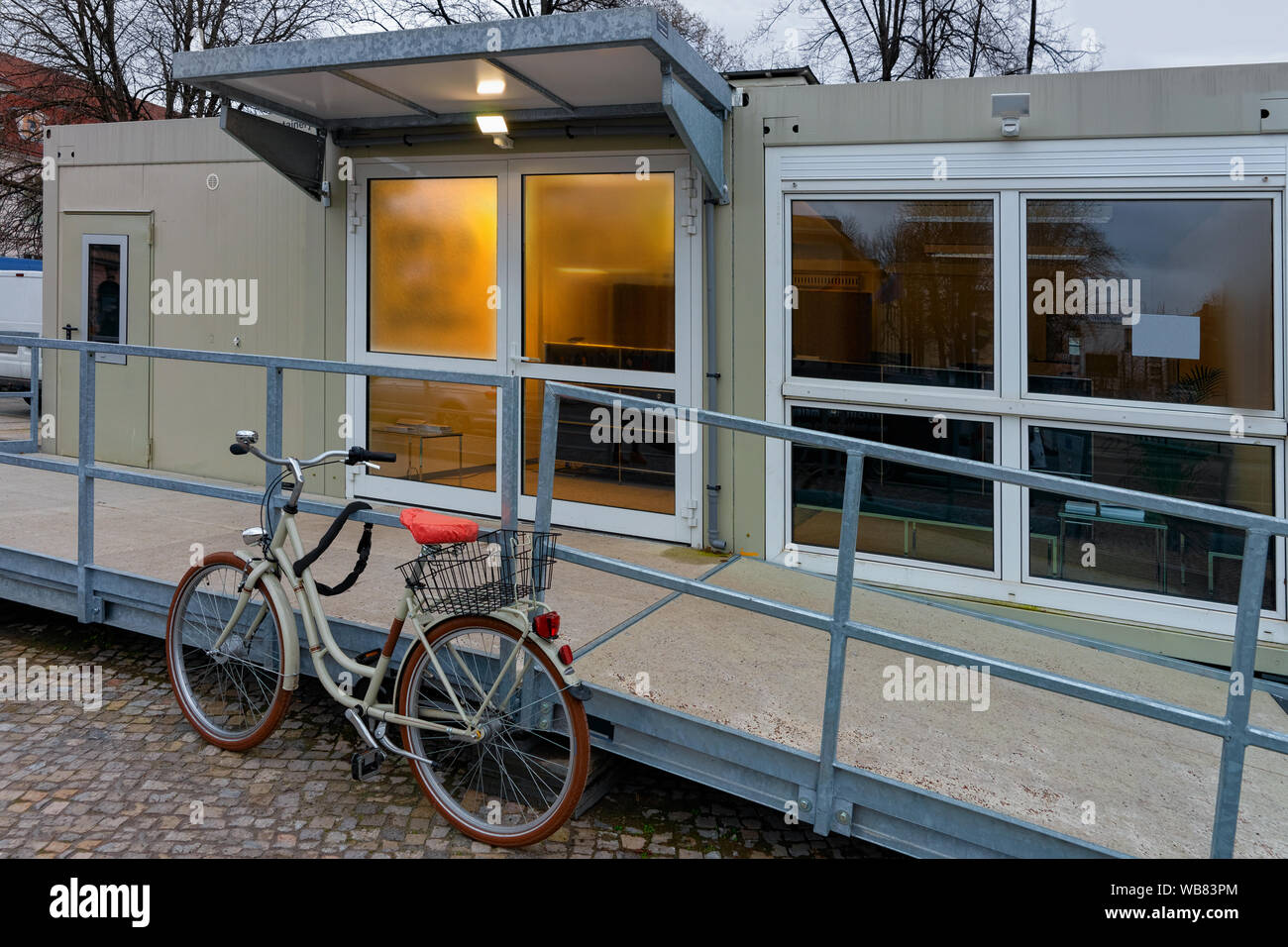 Bicycle parked at entrance into State Opera house Staatsoper in German ...