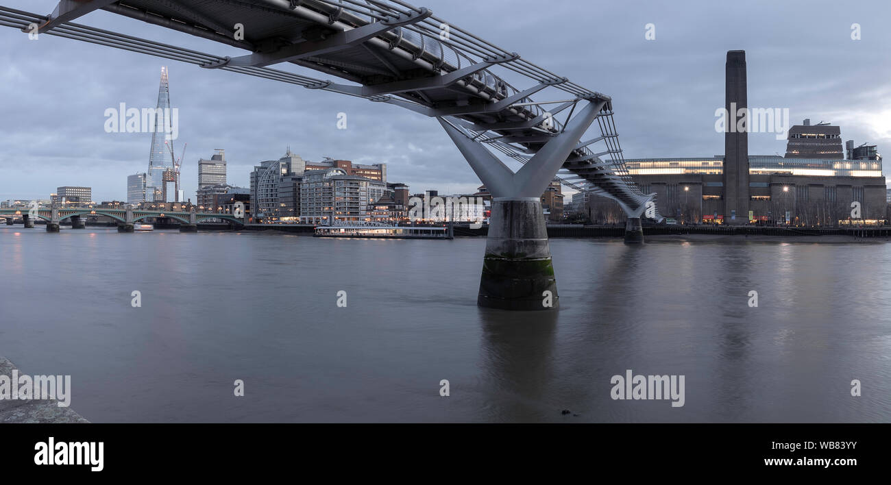 Evening in London near the riverside. Thames river and cityscape. Tate ...