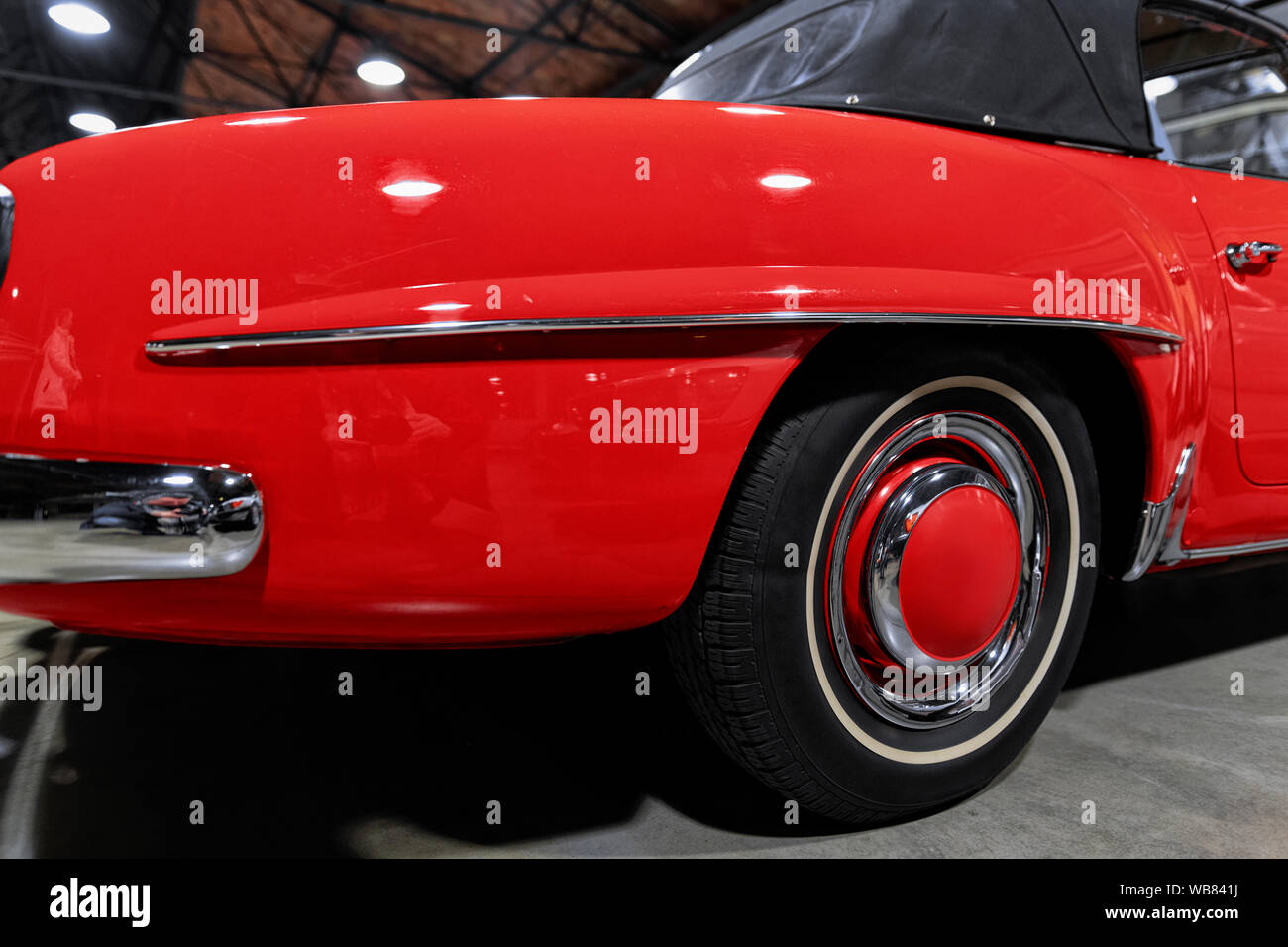Wheel of red vintage classic car in Berlin in Germany. Details of auto ...