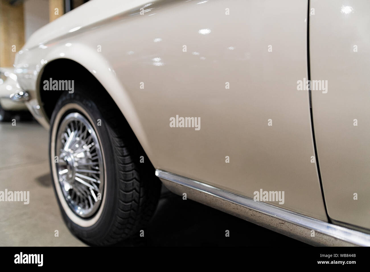 Wheel of white vintage classic car in Berlin in Germany. Details of ...