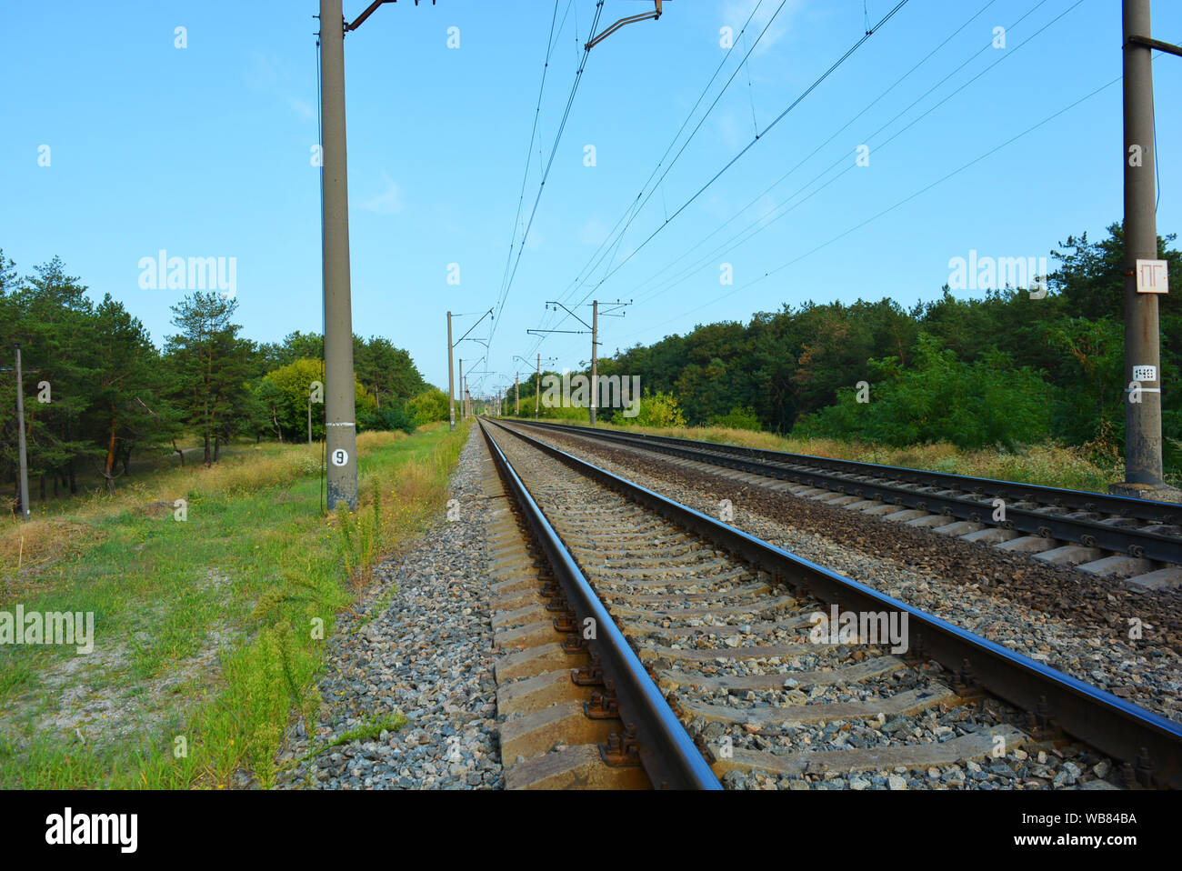 Railway track, railway and electric power lines for electric vehicles ...