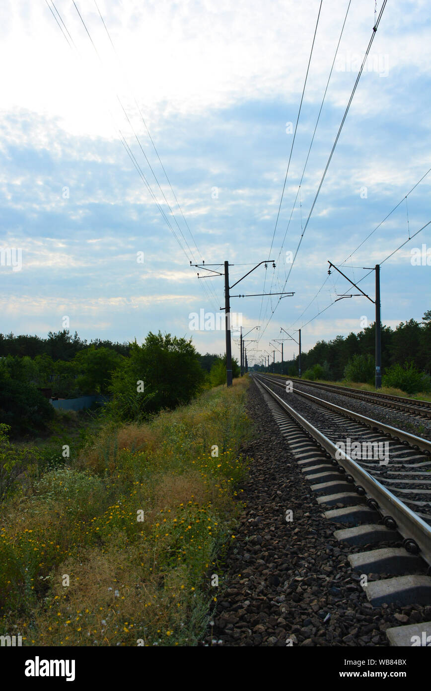 Railway track, railway and electric power lines for electric vehicles ...