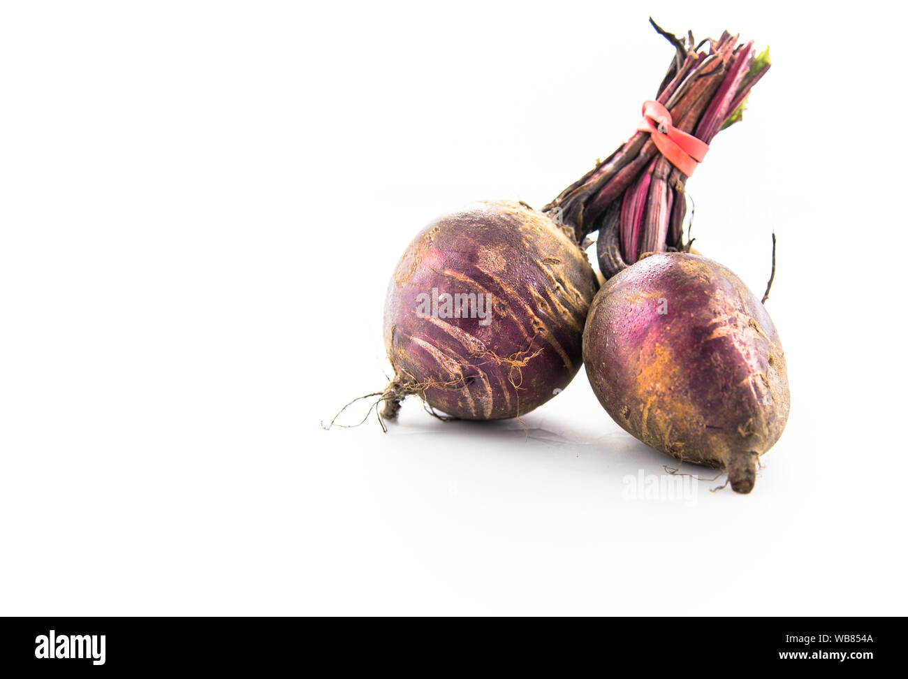 Beetroot bunch isolated on white background Stock Photo - Alamy