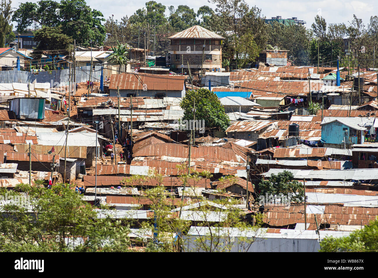 View of a section of Kibera slum showing makeshift shack housing ...