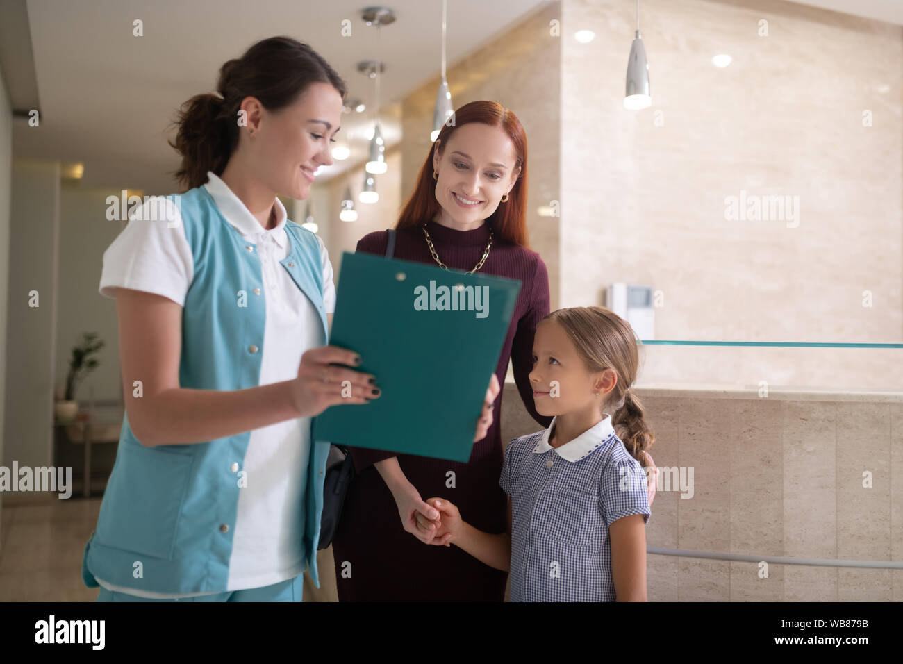 Documents mother daughter hi-res stock photography and images - Alamy