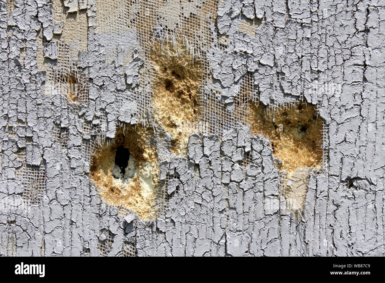 Cracked Broken Dilapidated Grey Family House Insulation Foam Boards cracked-broken-dilapidated-grey-family-house-insulation-foam-boards