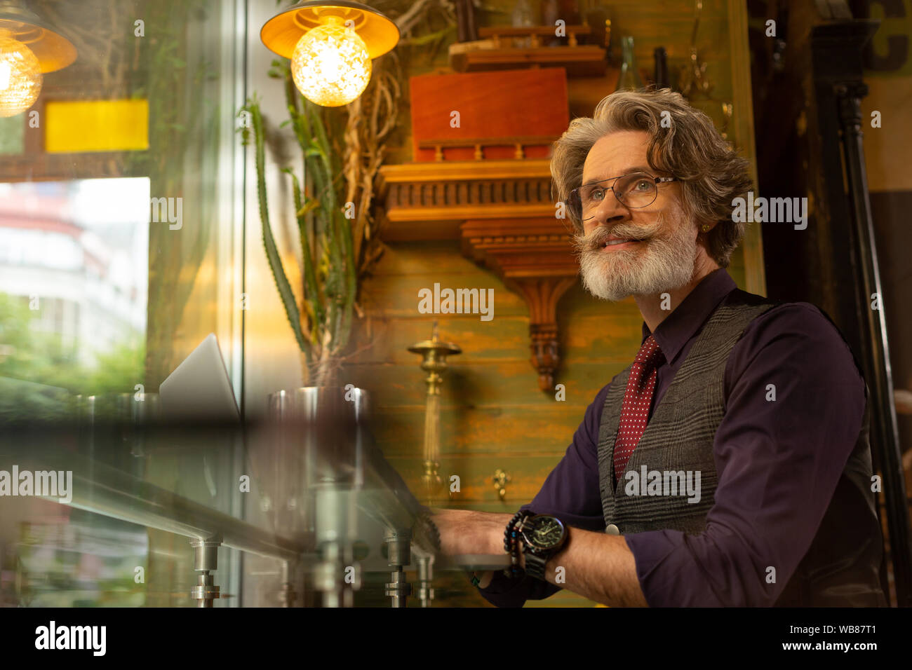 Thoughtful man sitting in the coffee shop Stock Photo - Alamy