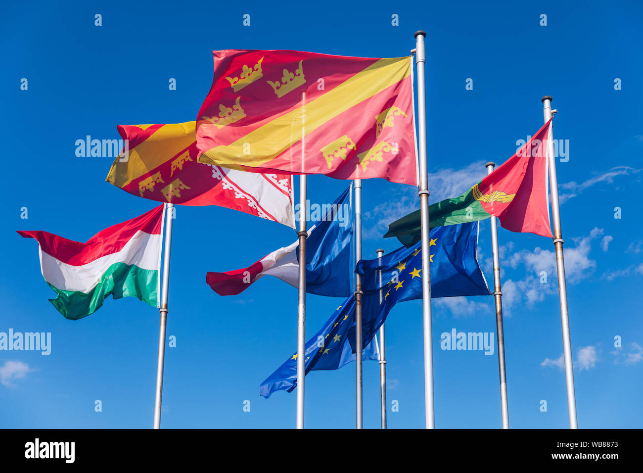 Flags on Place Rapp square, Colmar. Colmar is the third-largest commune ...