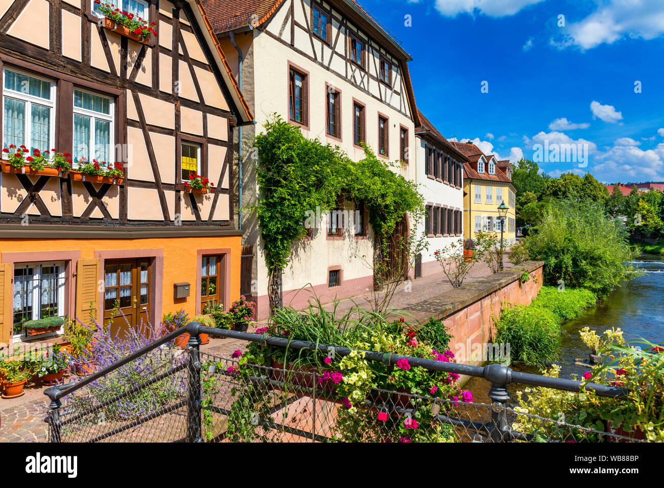 Old city of Ettlingen in Germany with a river and a church. View of a ...