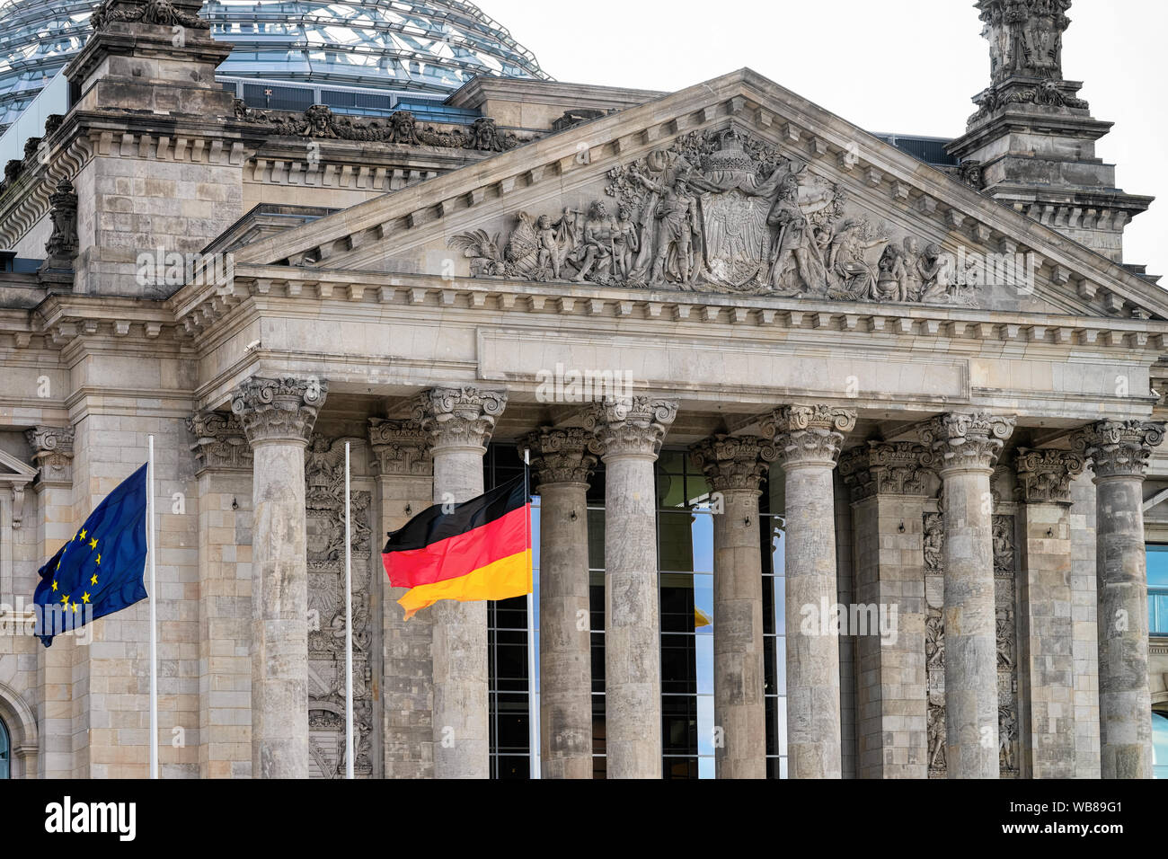 Reichstag building architecture and German and EU Flags in Berlin ...
