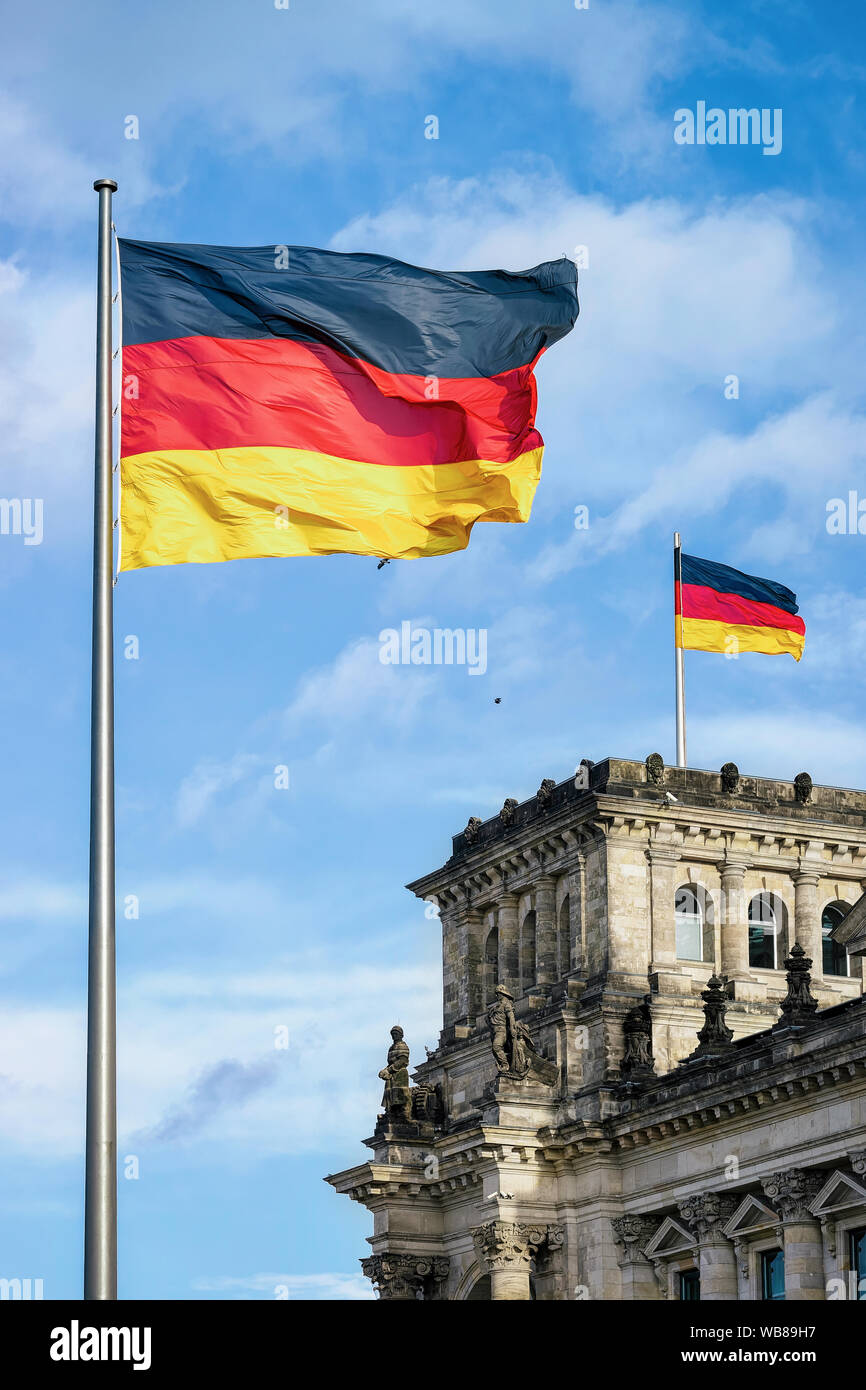 Reichstag building architecture and German Flags in Berlin, capital of ...
