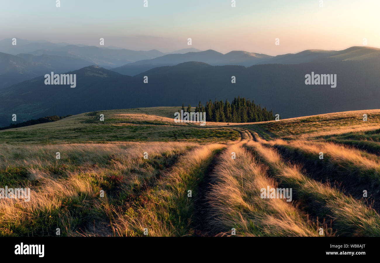 Ukraine, Karpaty mountains. Sunset in mountains . Evening countryside ...