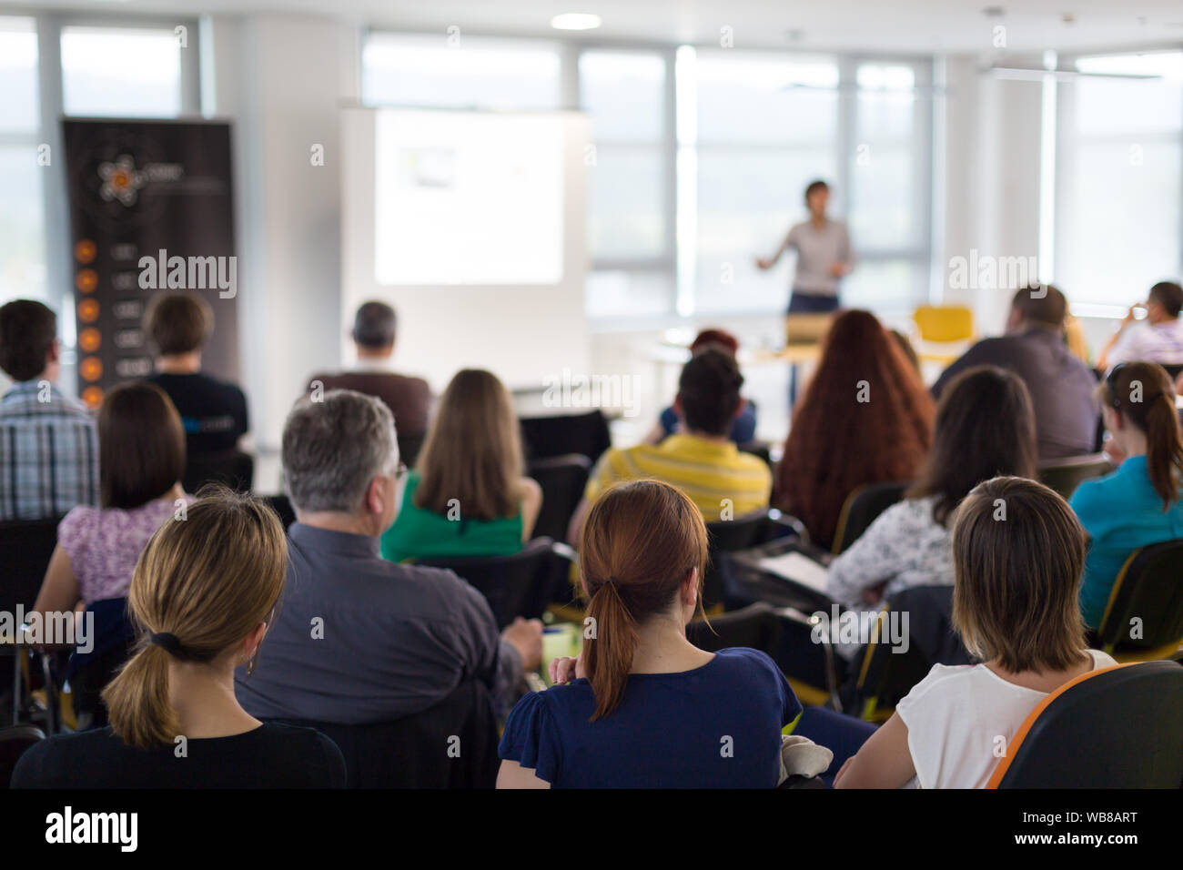 Speaker giving presentation on business conference Stock Photo - Alamy
