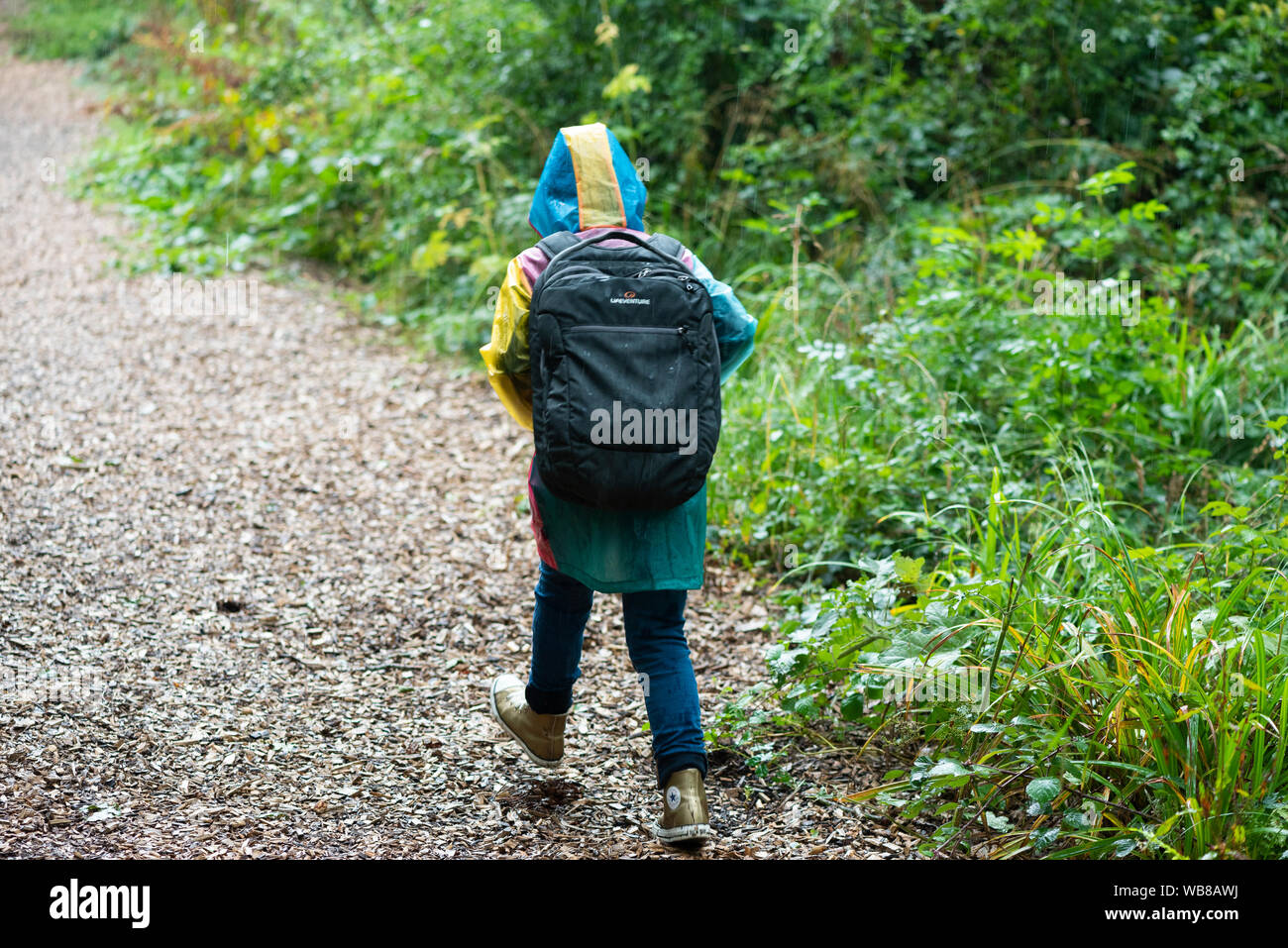 Child carrying rucksack hi-res stock photography and images - Alamy