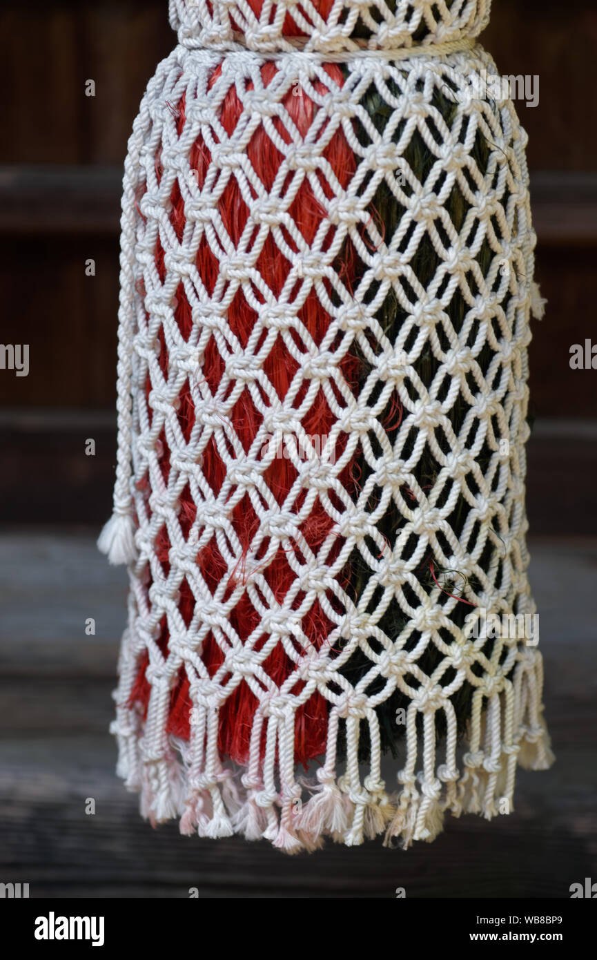Close-up of Suzu bell rope at a Shinto shrine in Japan Stock Photo - Alamy