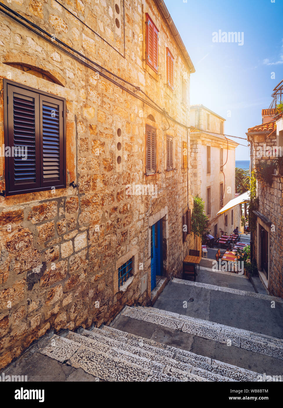 Beautiful street with flowers in the Hvar town, Hvar island, Dalmatia ...