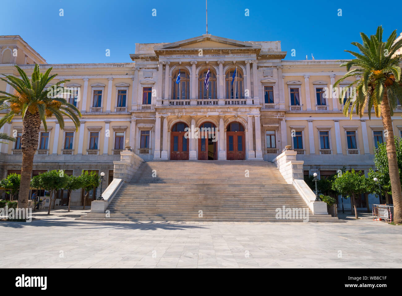 Facade of the neoclassical city Hall by Ernst Ziller in Miaouli square ...