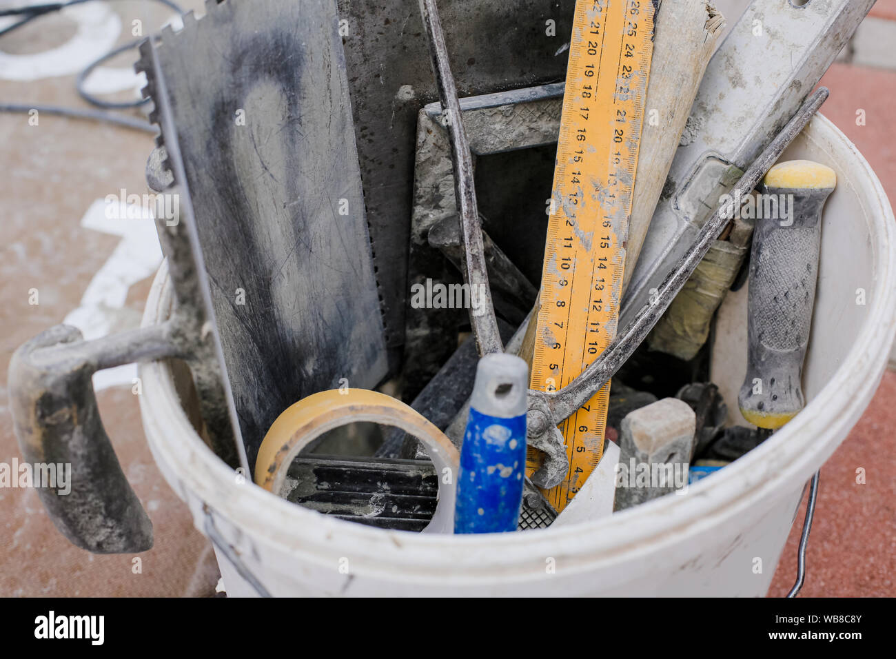 Tiler bucket hi-res stock photography and images - Alamy