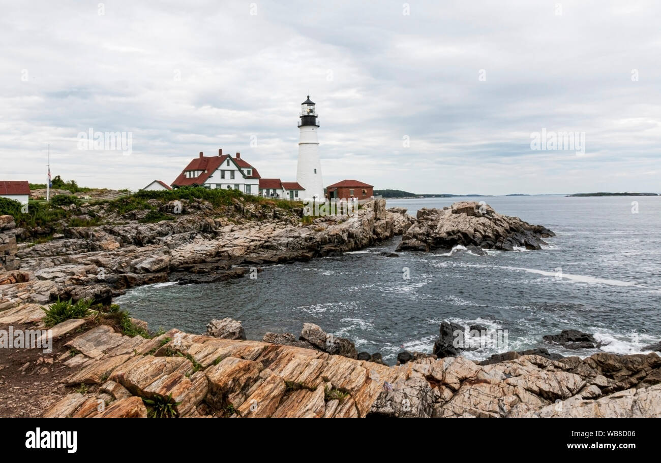 Wide view of The Portland Head Lighthouse located in Fort Williams Park ...