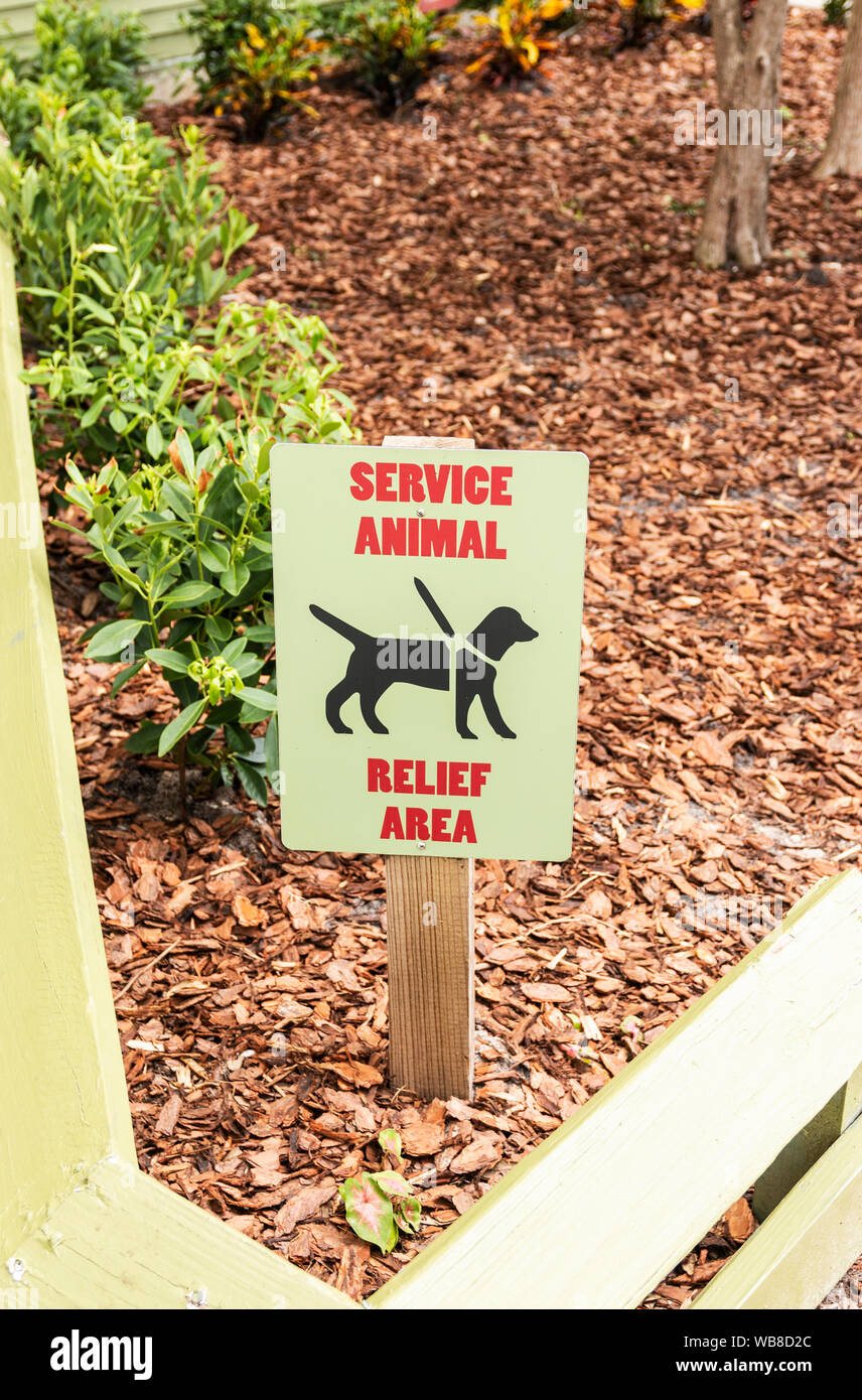 A sign is set up outside informing people with service animals that ...