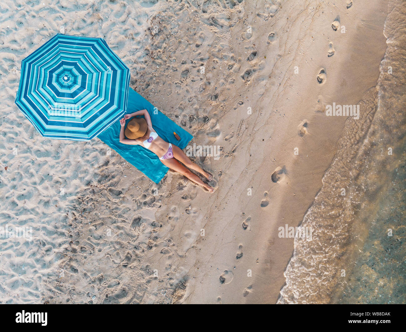 Woman sunbed bikini hi-res stock photography and images - Alamy