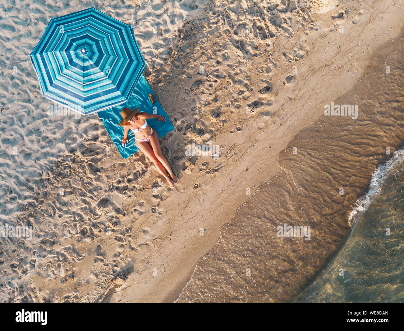 Woman sunbed bikini hi-res stock photography and images - Alamy