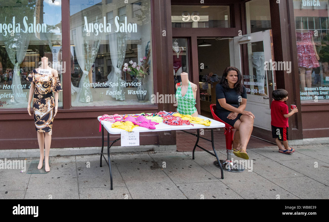 Women in front of store Stock Photo - Alamy