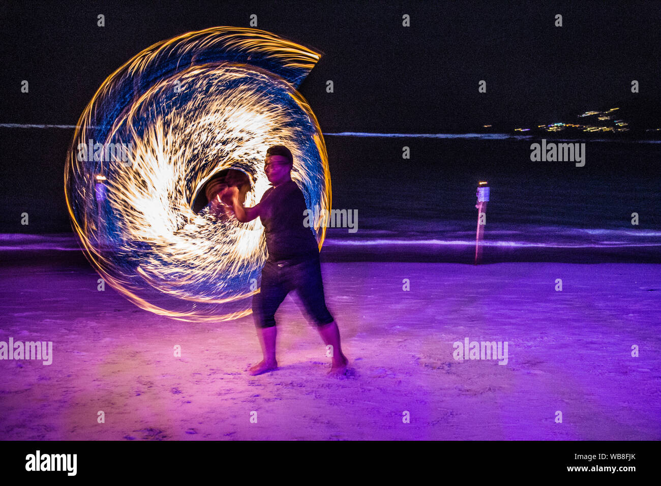 Fire show on the beach in Koh Samui in Thailand Stock Photo - Alamy