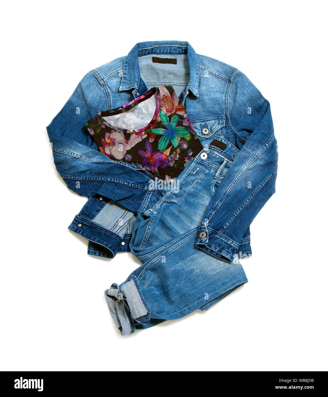 Women's denim clothing collection on white background. Composition with ...