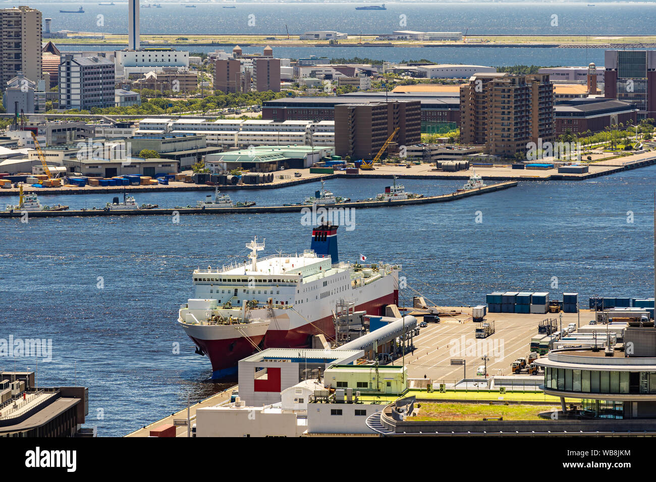 Aerial view of Tourist Cruise ship liner at Kobe port bay in downtown ...