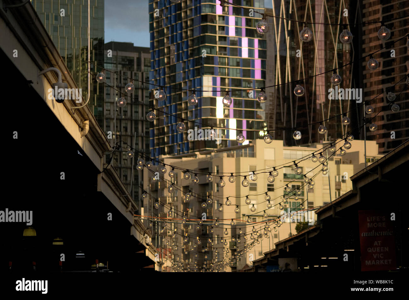 A hanging string of lights at Queen Victoria Night Market with the ...