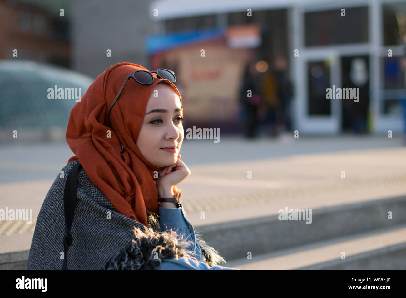 Beautiful Muslim young girl posing on the street in Istanbul Stock ...