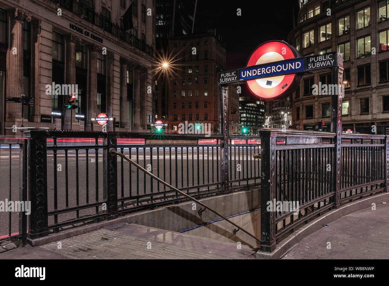 Underground signs in London streets at night Stock Photo - Alamy