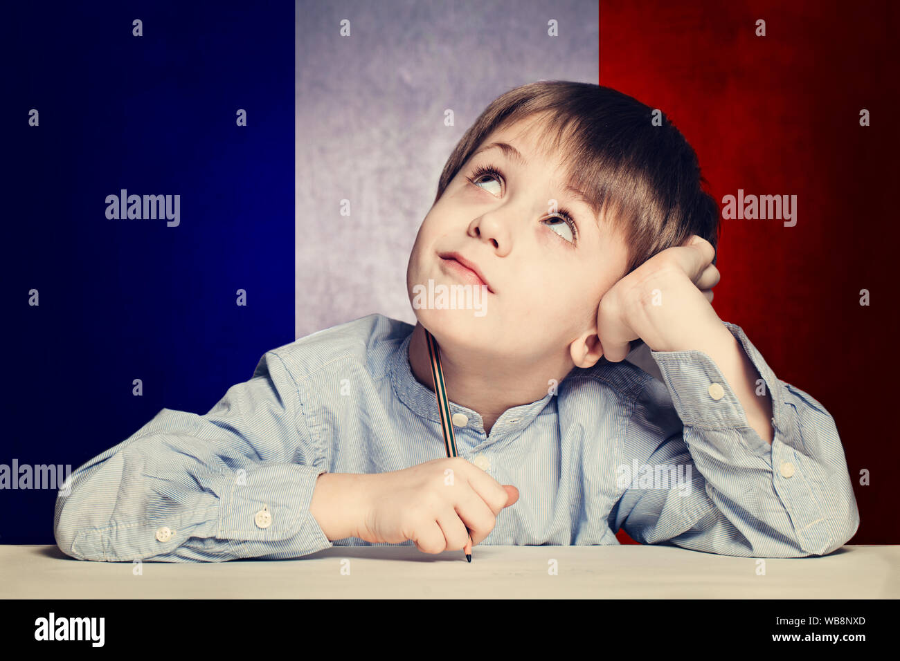 Learn french language concept. Happy child student with flag France ...