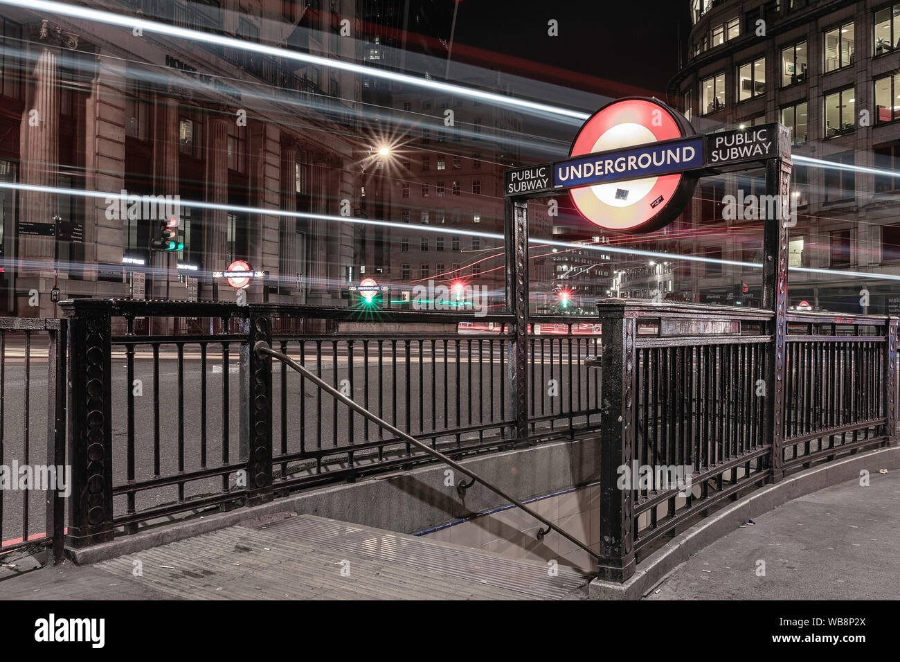 Underground signs in London streets at night Stock Photo - Alamy