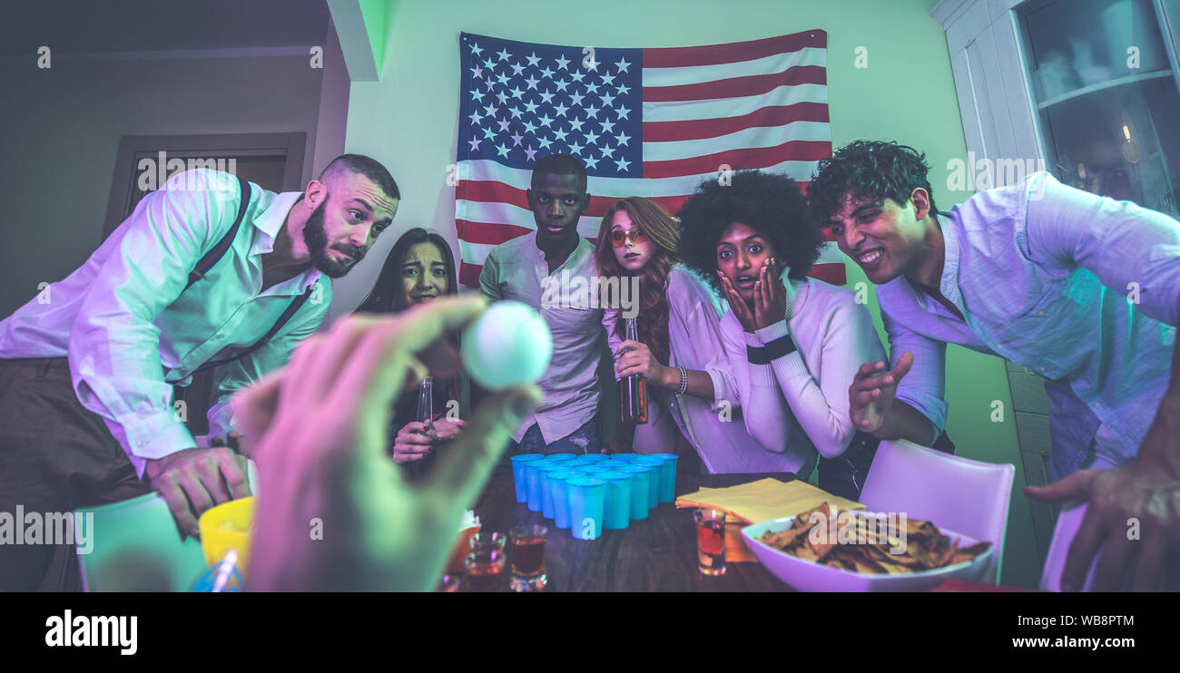 A group of young people celebrating and making party at home Stock ...