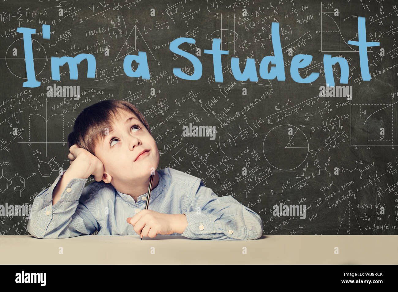 Clever child pupil on blackboard background portrait. Back to school ...
